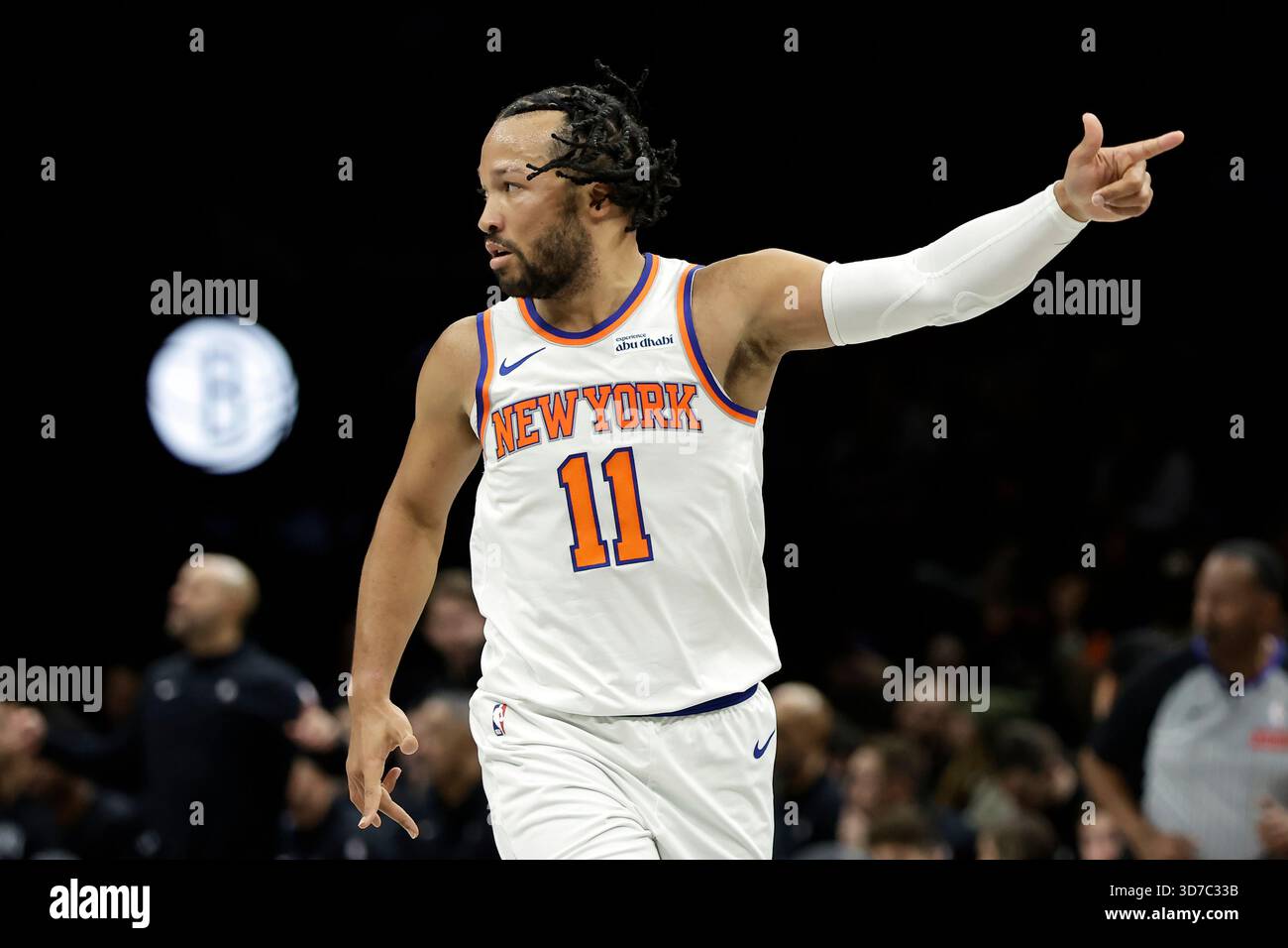 New York Knicks guard Jalen Brunson (11) reacts after making a three ...
