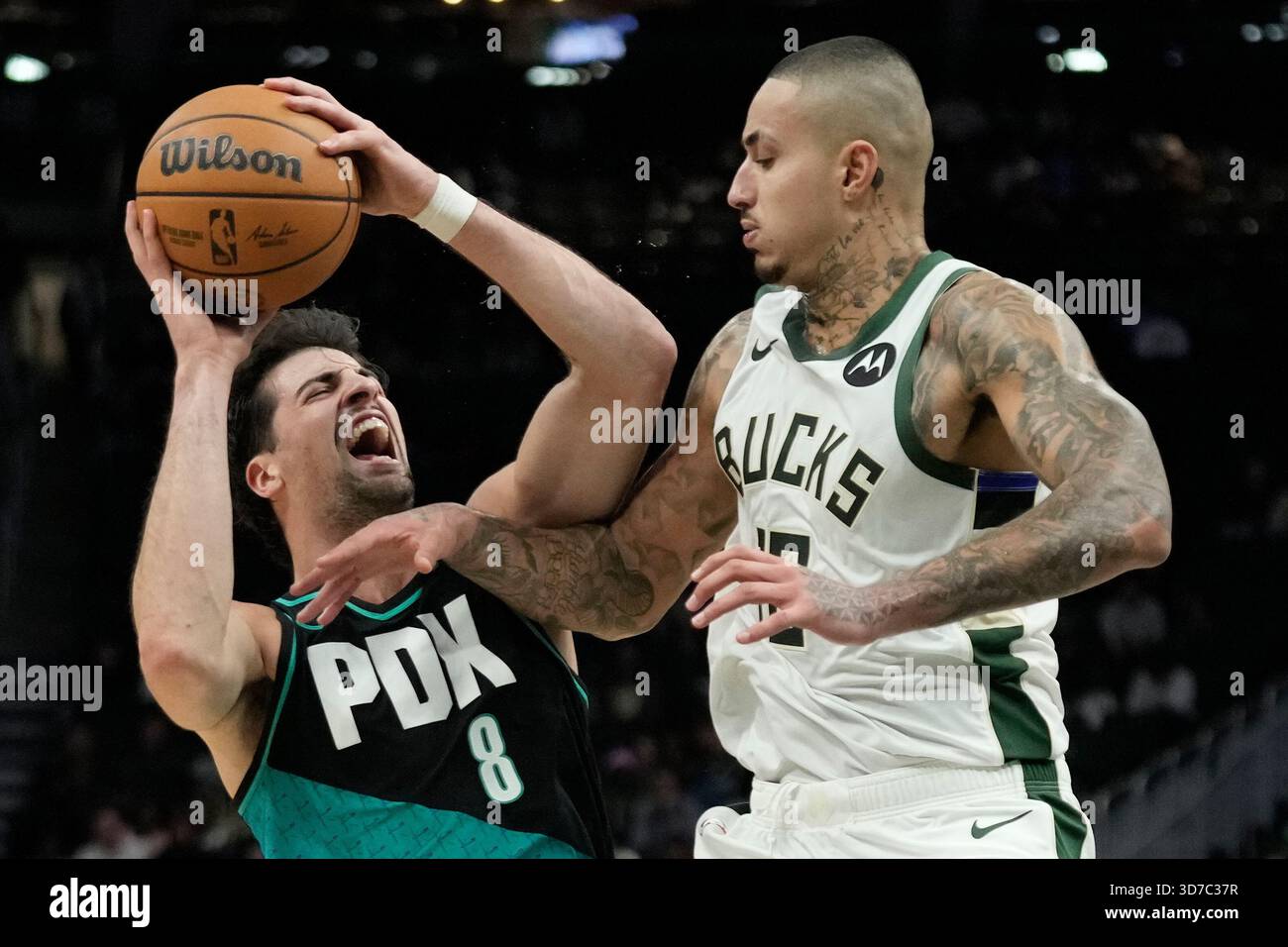Portland Trail Blazers' Deni Avdija (8) drives to the basket against ...