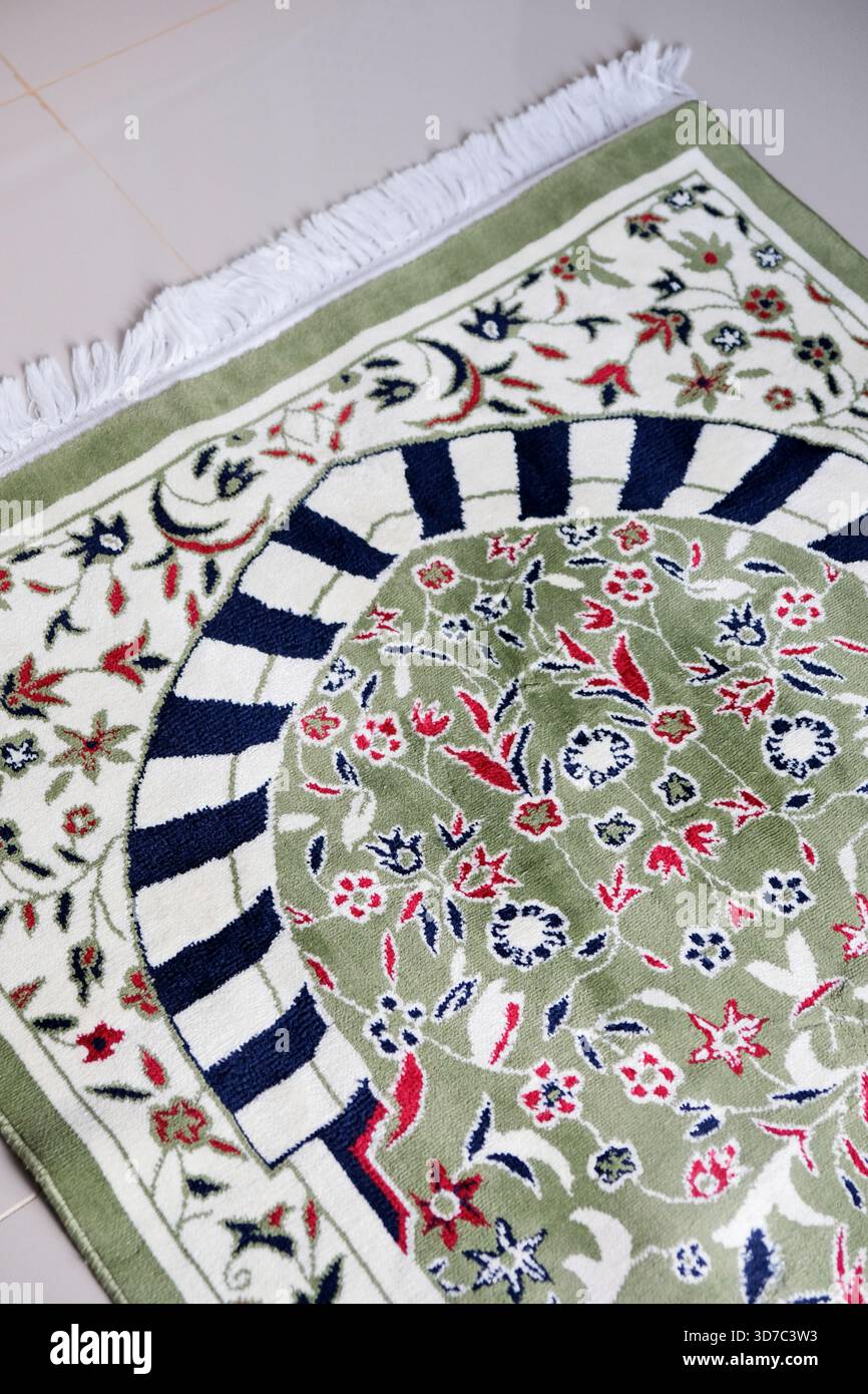 Muslim prayer rug on hi-res stock photography and images - Alamy