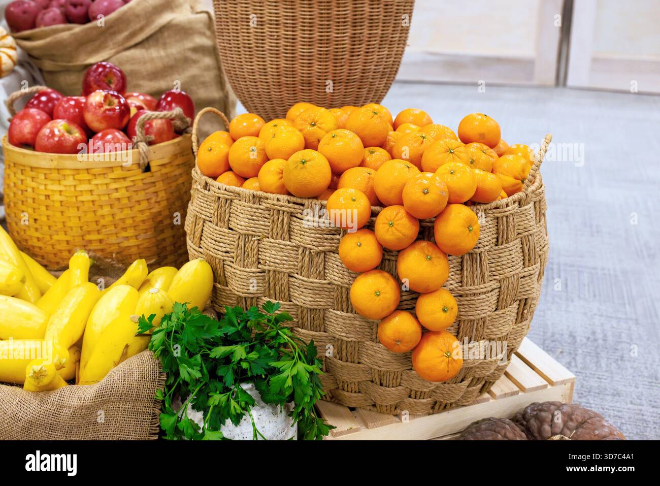 Colorful oranges fresh vegetables are arranged in baskets at vibrant ...