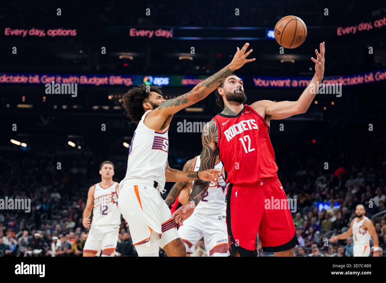 Houston Rockets center Steven Adams (12) catches the ball in front of ...