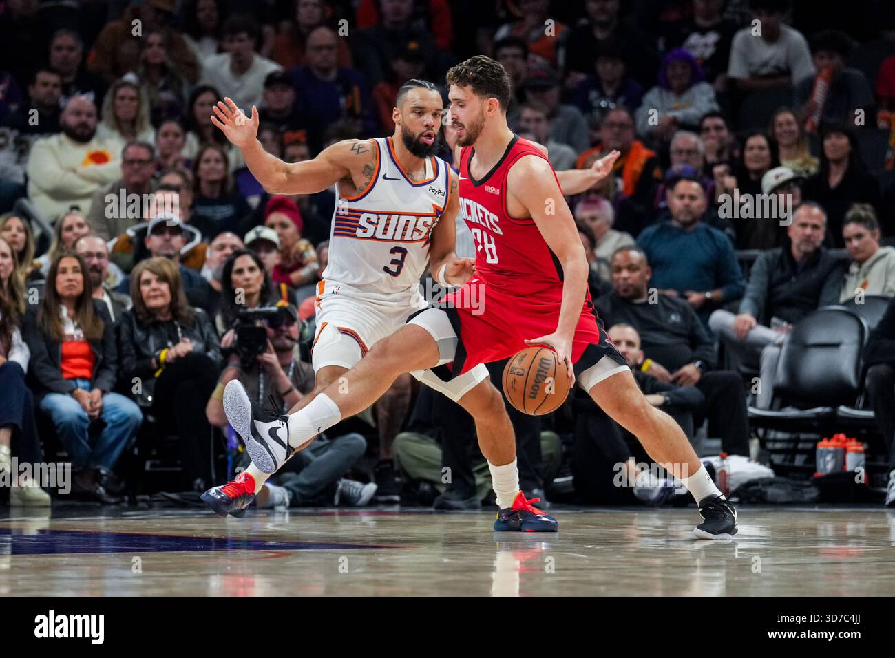Houston Rockets center Alperen Sengun (28) dribbles the ball in front ...