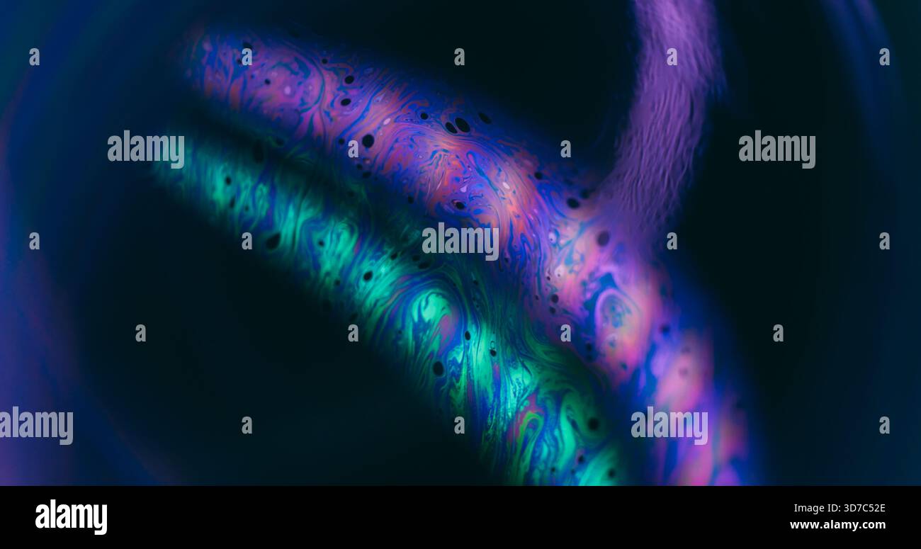 Defocused emulsion spill circling fluid hi-res stock photography and ...