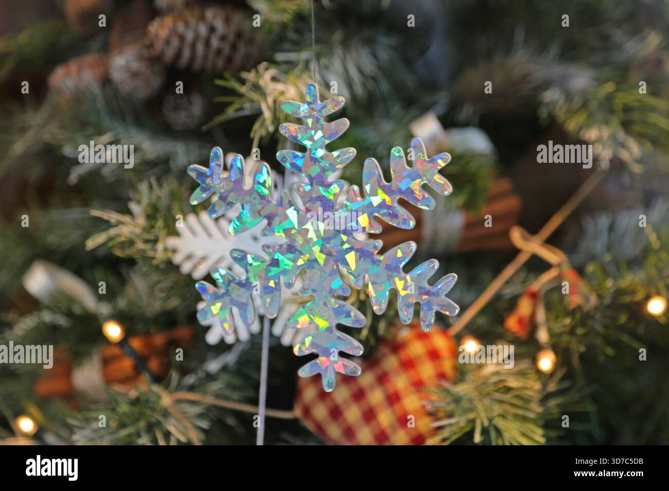 One Large Rainbow Snowflake Crystal Decor at Christmas Tree Stock Photo ...