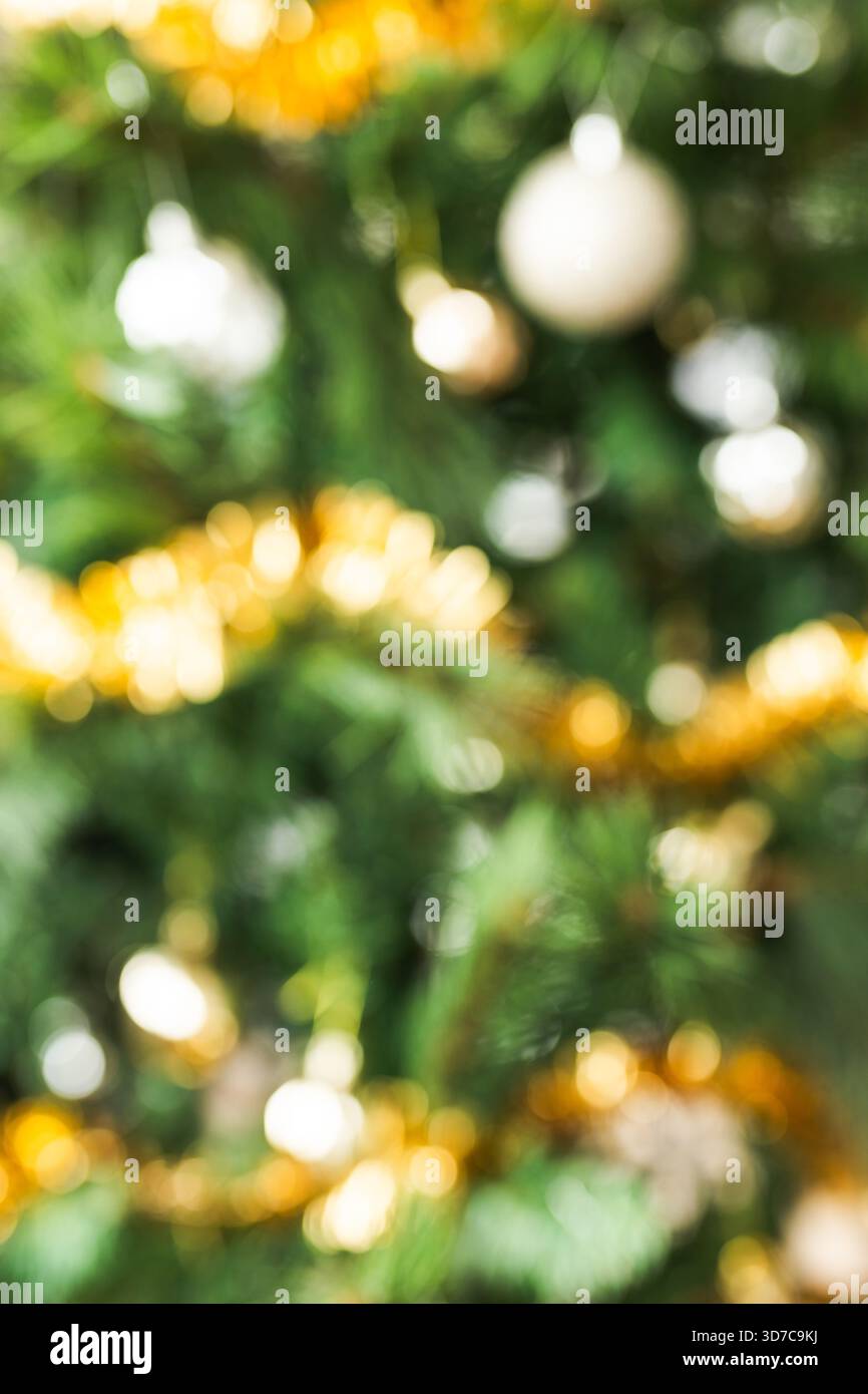 blurred christmas background with golden and silver decorations and ...
