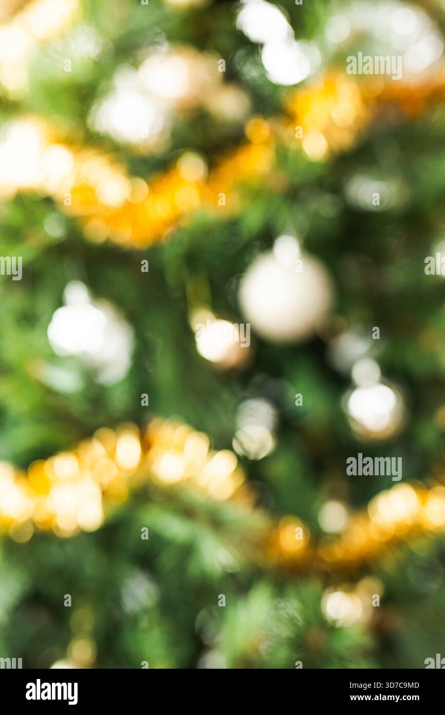 blurred christmas background with golden and silver decorations and ...