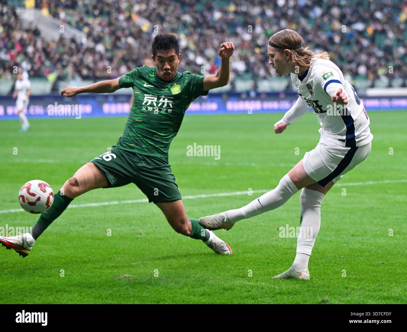 Beijing Guoan Football Club defeated Meizhou Hakka Football Club with 5 ...