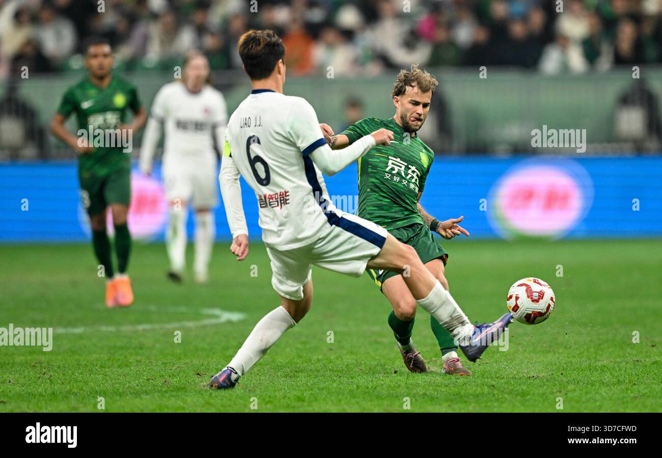 Beijing Guoan Football Club defeated Meizhou Hakka Football Club with 5 ...
