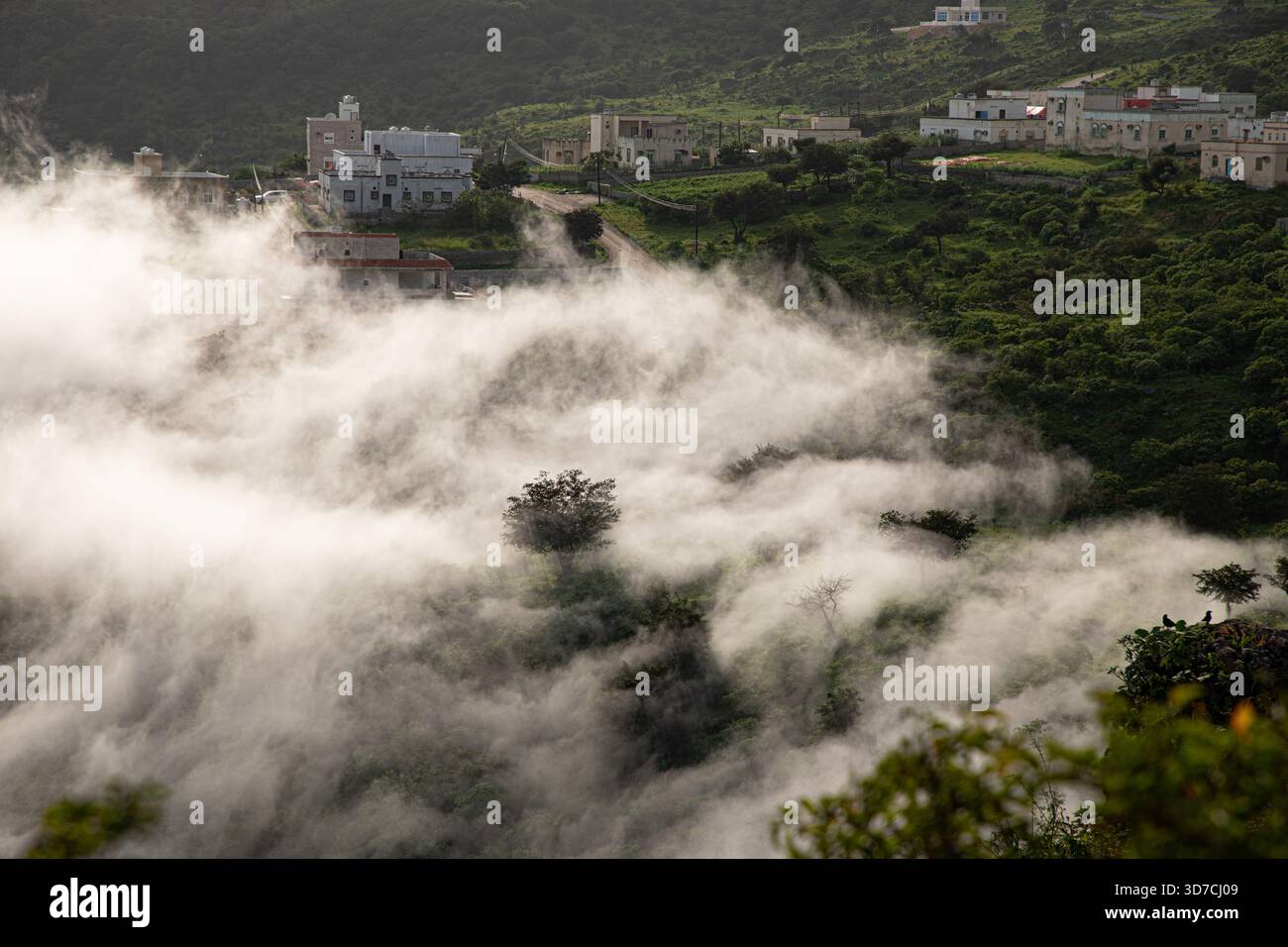 fog cover some houses at Dim village the last village at Oman connect ...