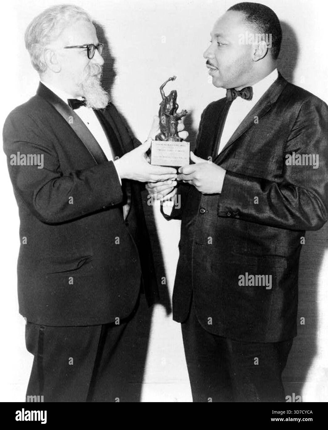 Rabbi Abraham Joshua Heschel, three-quarter length portrait, presenting ...