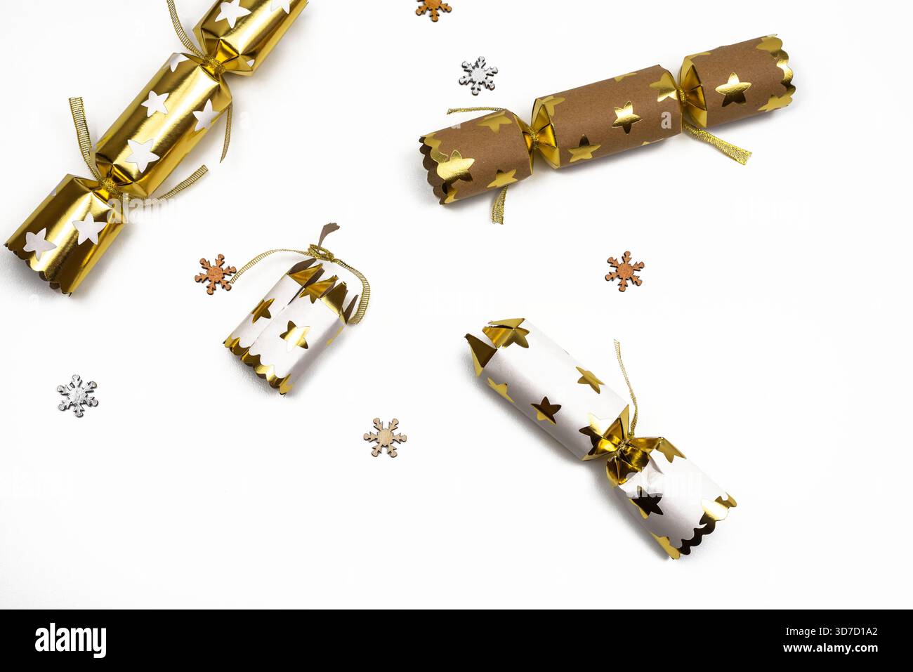 Two Christmas crackers and 1 popped cracker. Christmas background ...