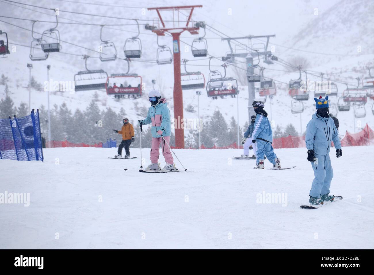 Tourists enjoy skiing in Altay City, northwest China's Xinjiang Uygur ...