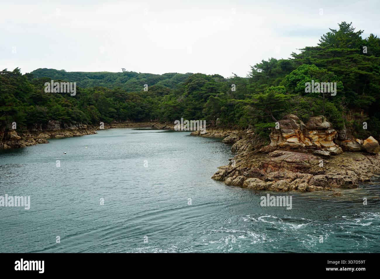 Rocky coast of an island on the Japanese coast in the Saikai National ...
