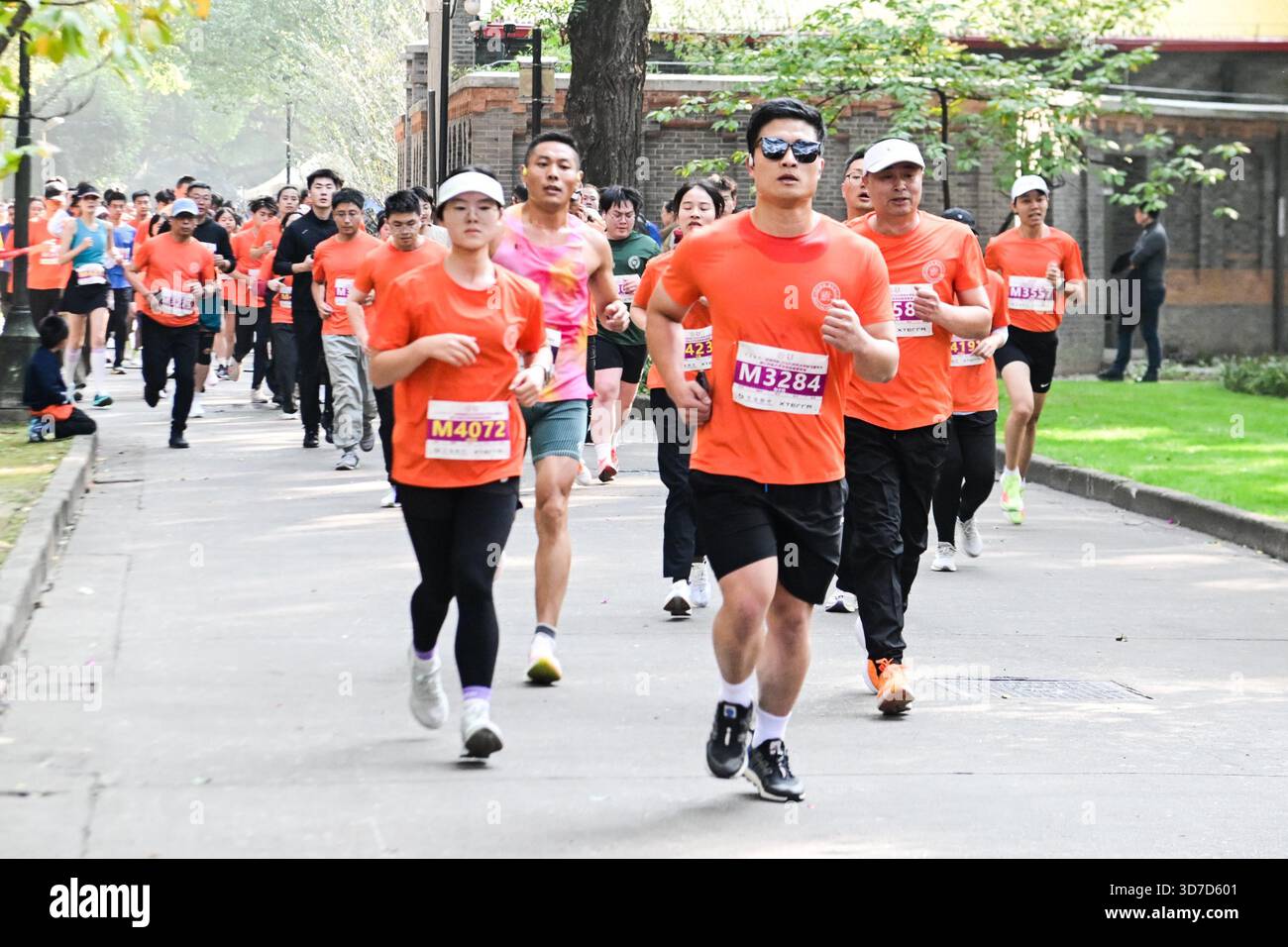 College students participate in a running event in Suzhou City, east ...