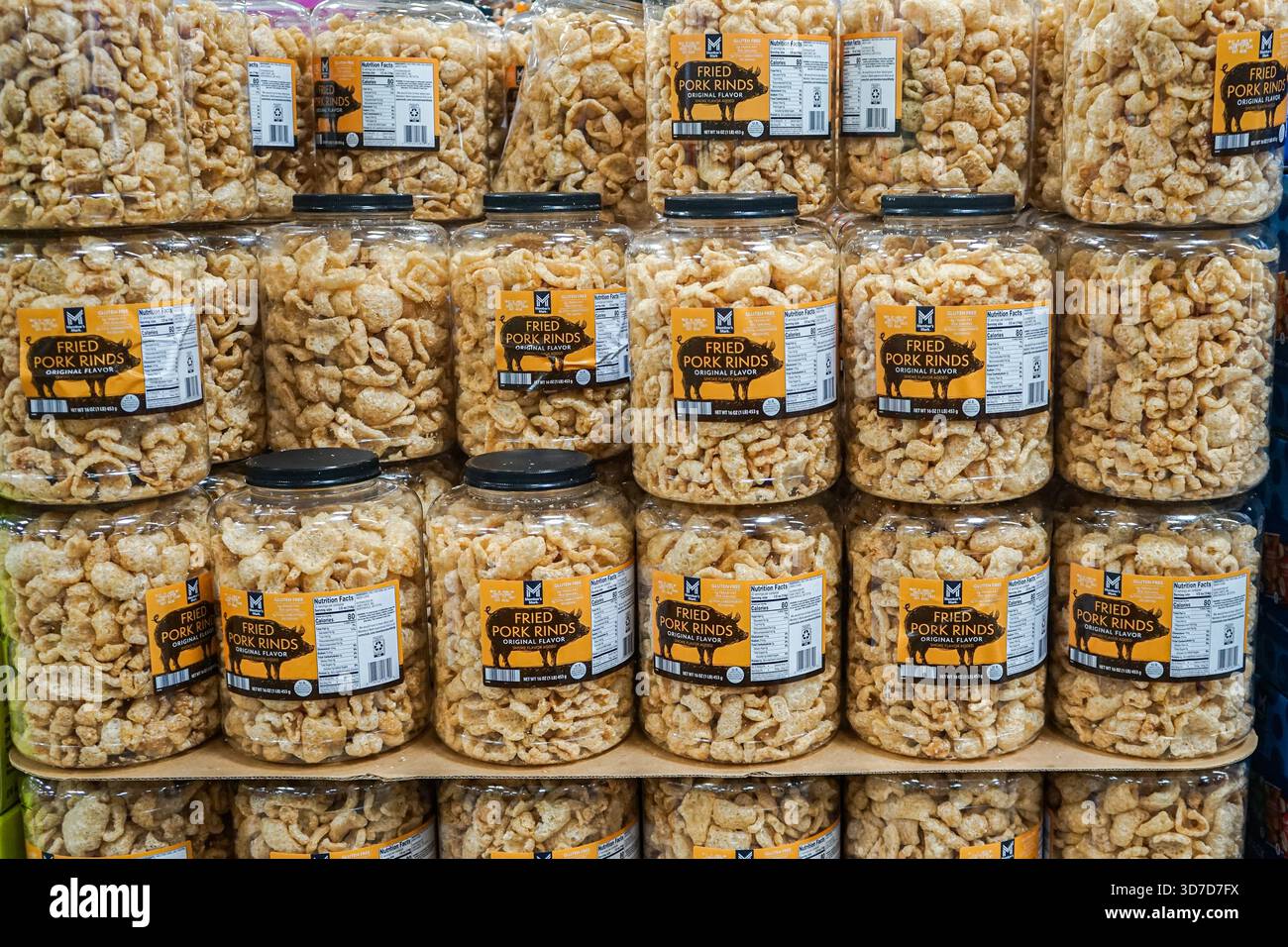 Close up view of plastic buckets of Member's Mark pork rinds stacked in ...