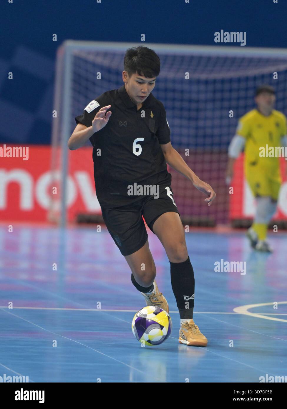 Sangrawee Meekham of Thailand Women Futsal team dribbles the ball ...