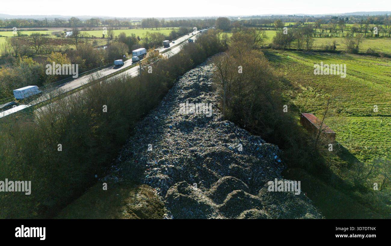 A general view of the 150m long mountain of rubbish that has been ...
