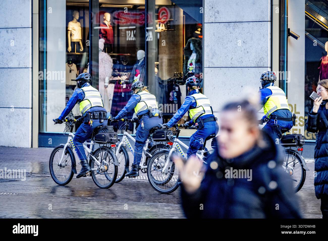 THE HAGUE - Law enforcement officers monitor bicycles ANP /HOLLANDSE ...