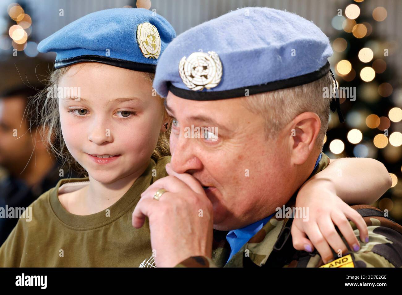 Cara Corcoran with her dad, Lt Colonel Ronan Corcoran, after he arrived ...