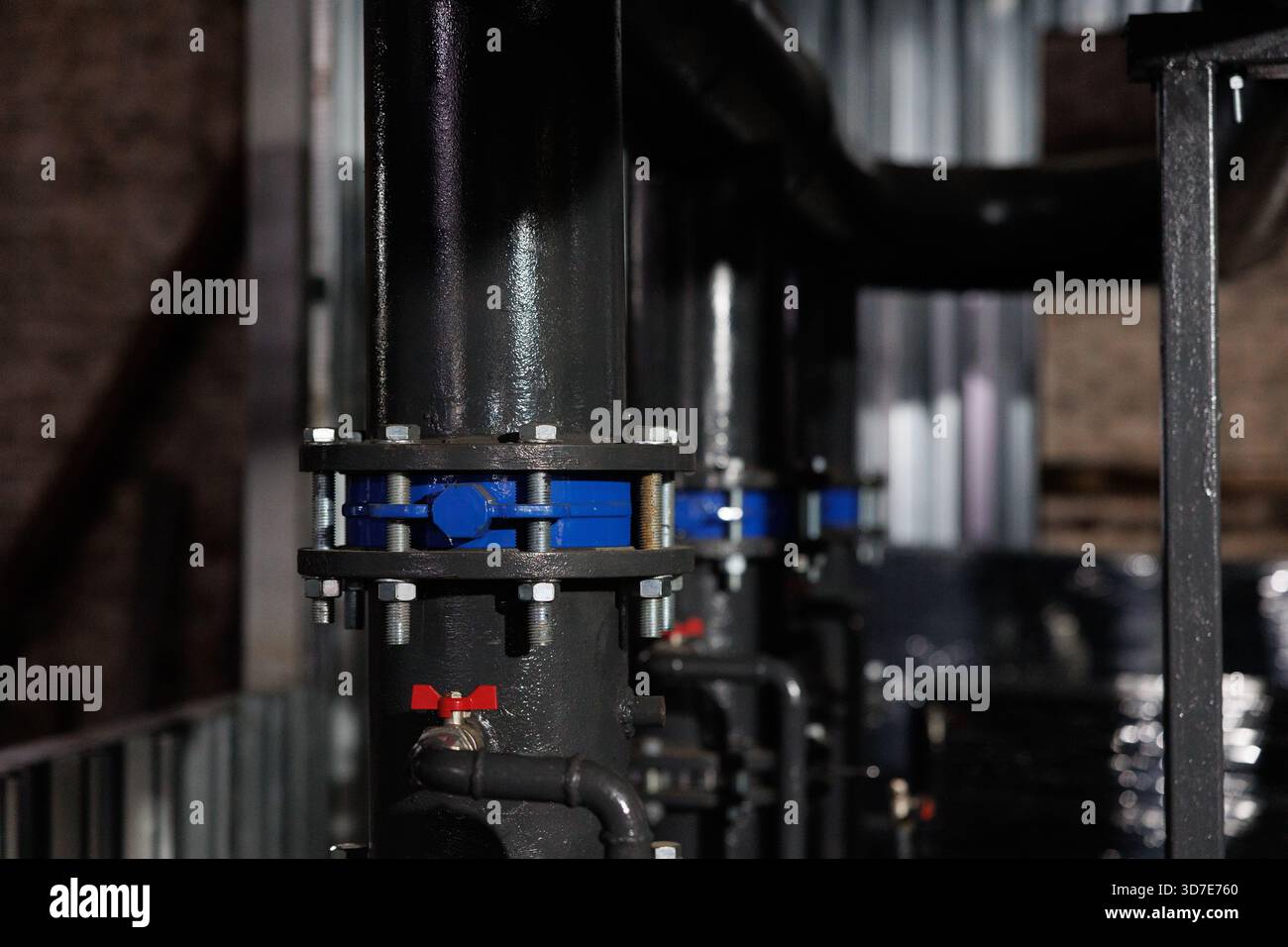 Industrial pipes with blue accents creating a striking visual in a ...