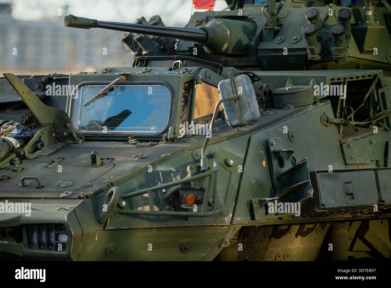 NATO armored combat vehicle with turreted weapon system representing ...
