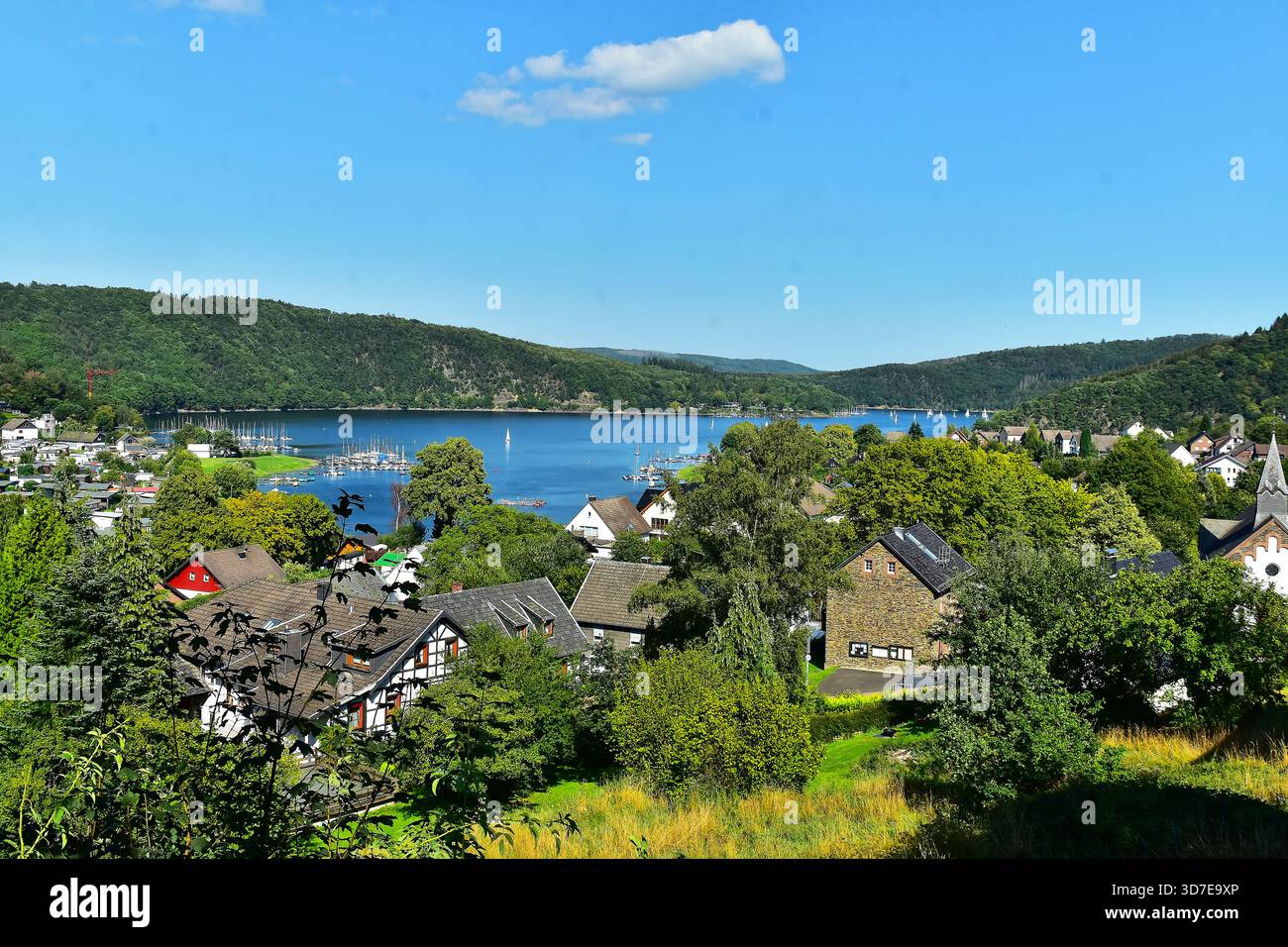The Rursee lake and the village of Woffelsbach in the northern Eifel ...
