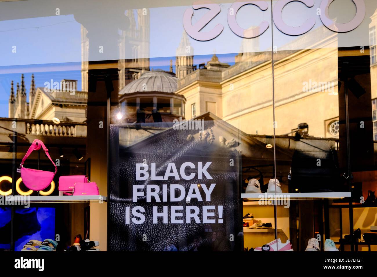 Bath, 25th Nov 20245. Black Friday promotion reflected in a shop window ...