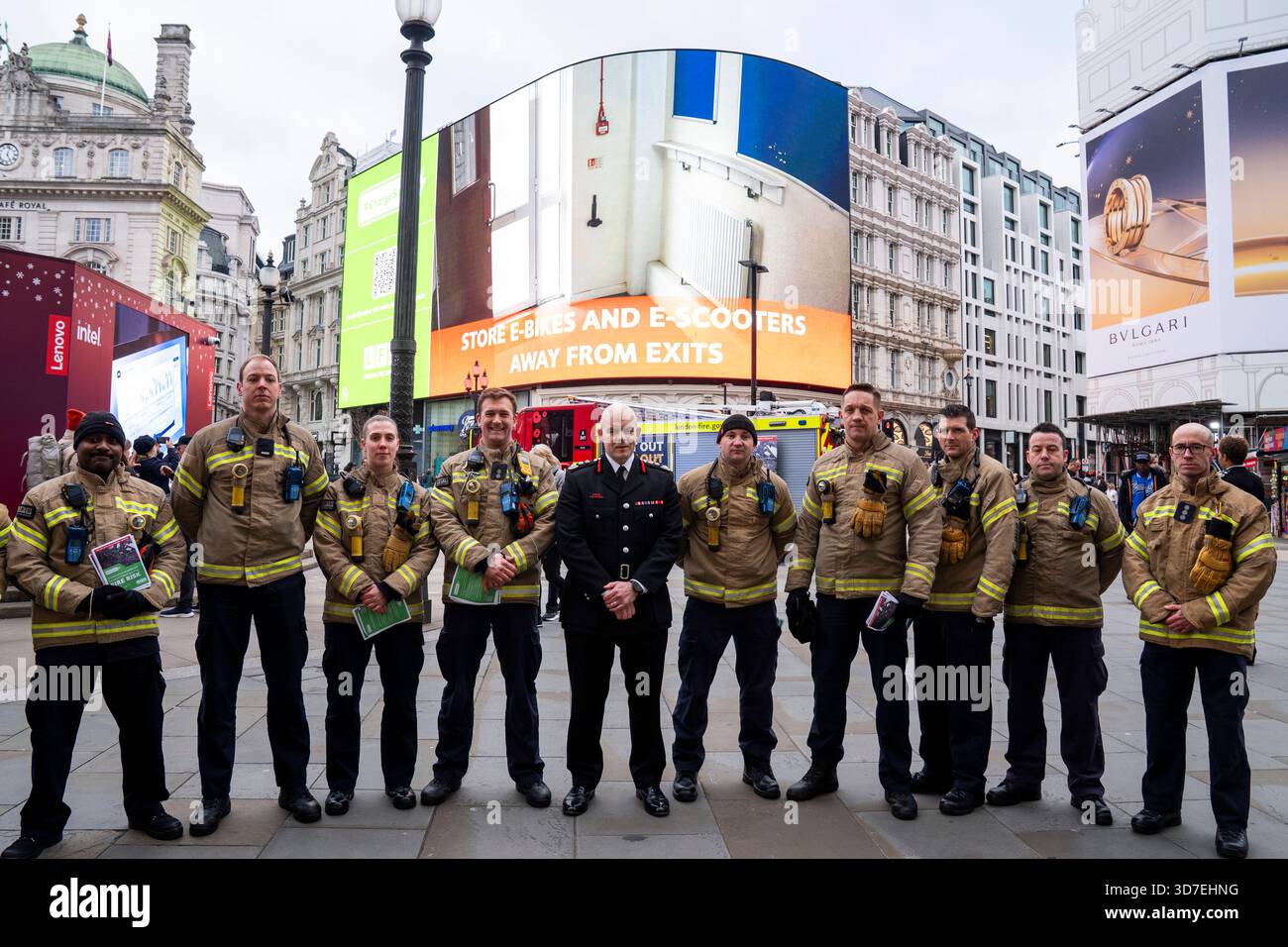 London Fire Commissioner Jonathan Smith (centre) with firefighters at ...