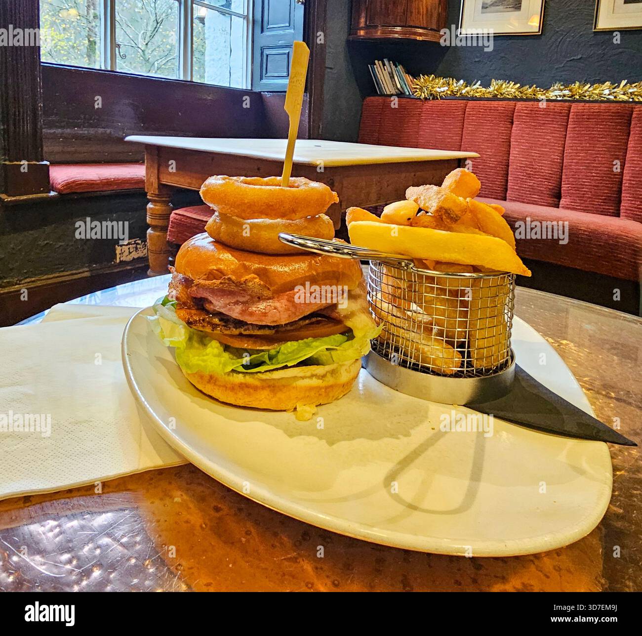 Badger Bar, Rydal, chicken burger with onion rings and chips Stock ...