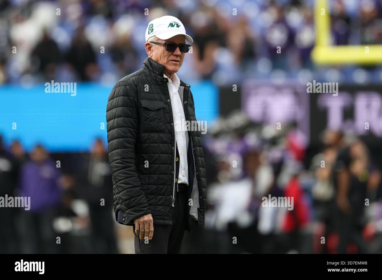 New York Jets owner Woody Johnson looks on during pre-game warm-ups ...