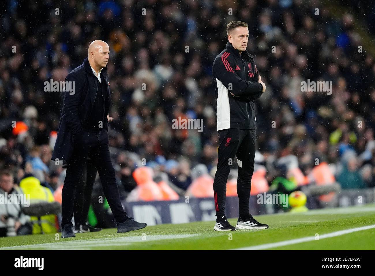 Liverpool manager Arne Slot (left) and coach Aaron Briggs during the ...