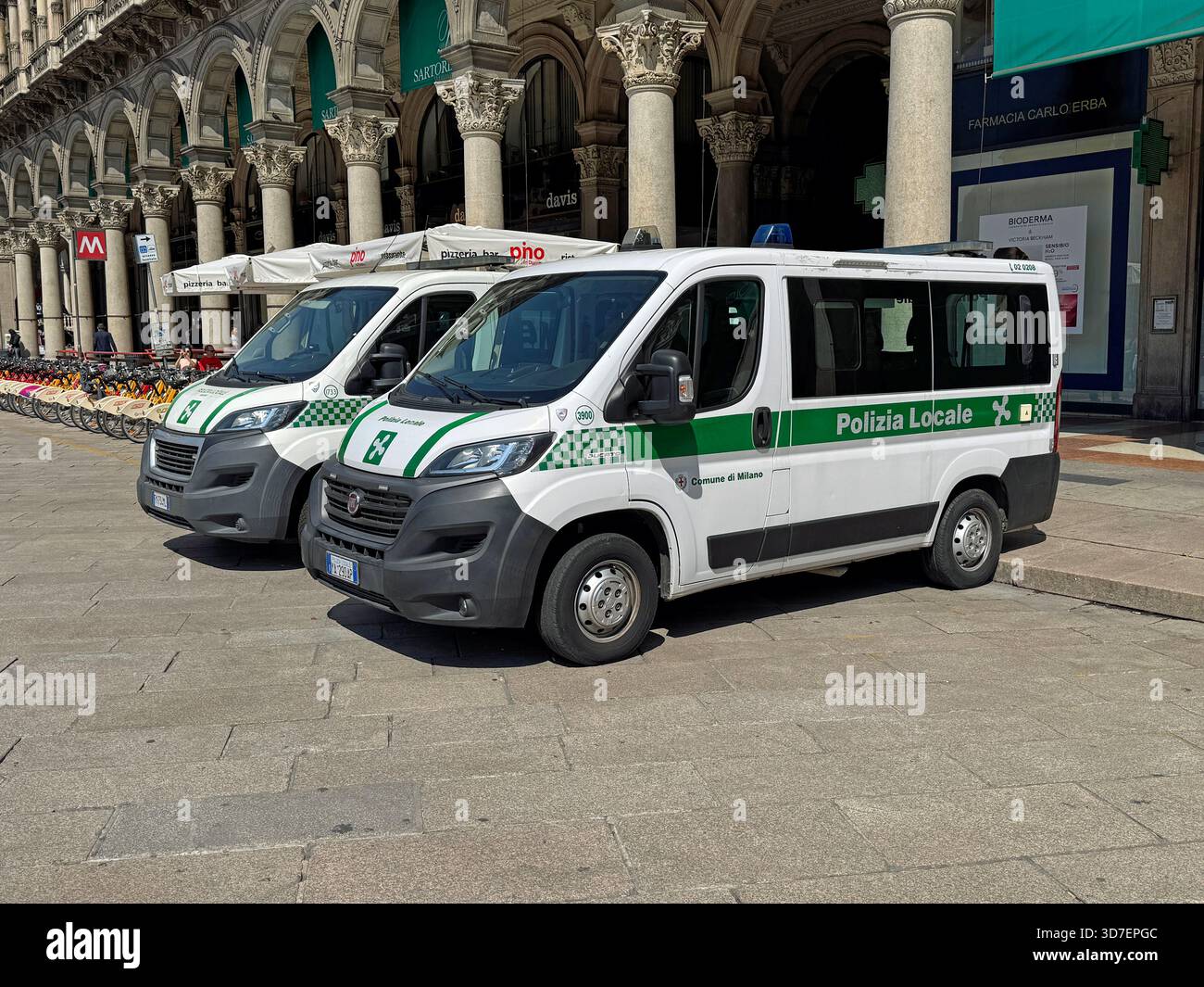 Milan, Italy - April 28, 2025: Italian local police vans parked on a ...