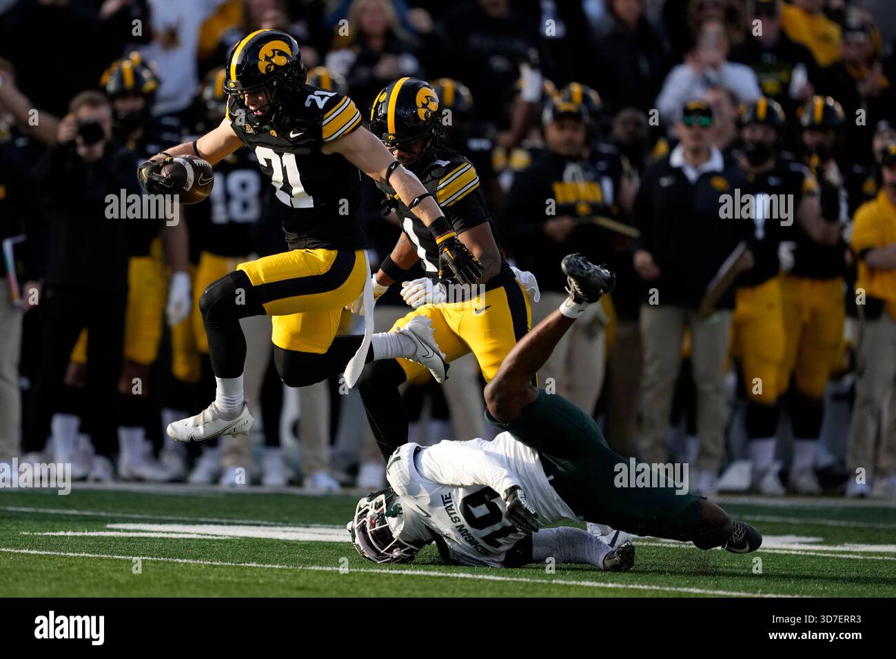 Iowa wide receiver Kaden Wetjen (21) returns a punt for a touchdown ...