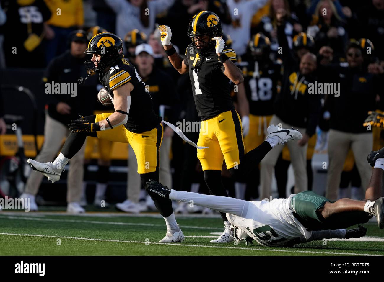 Iowa wide receiver Kaden Wetjen (21) returns a punt for a touchdown ...