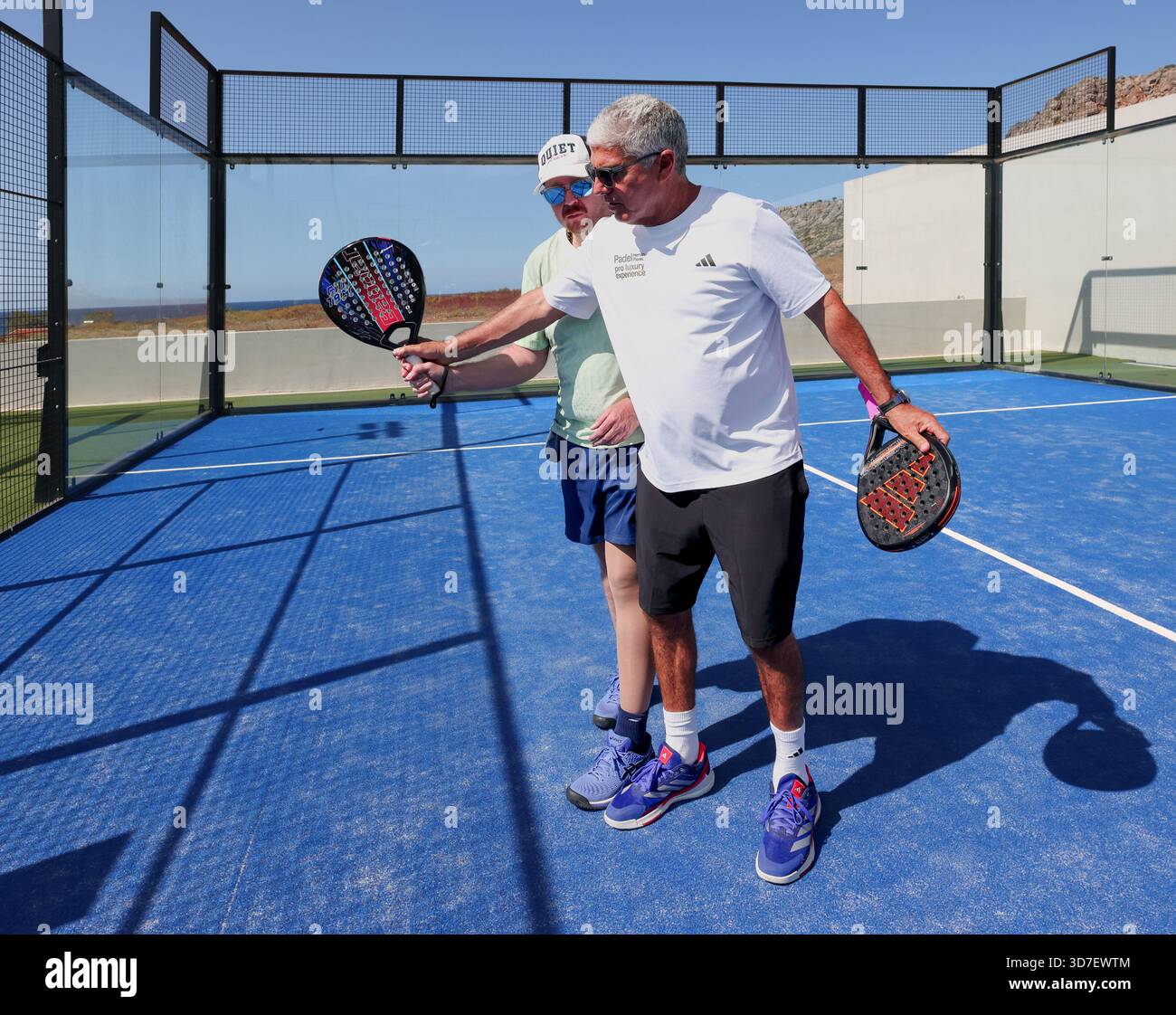 Padel coach Hernan Flores and player at the Kalimera Kriti Hotel ...