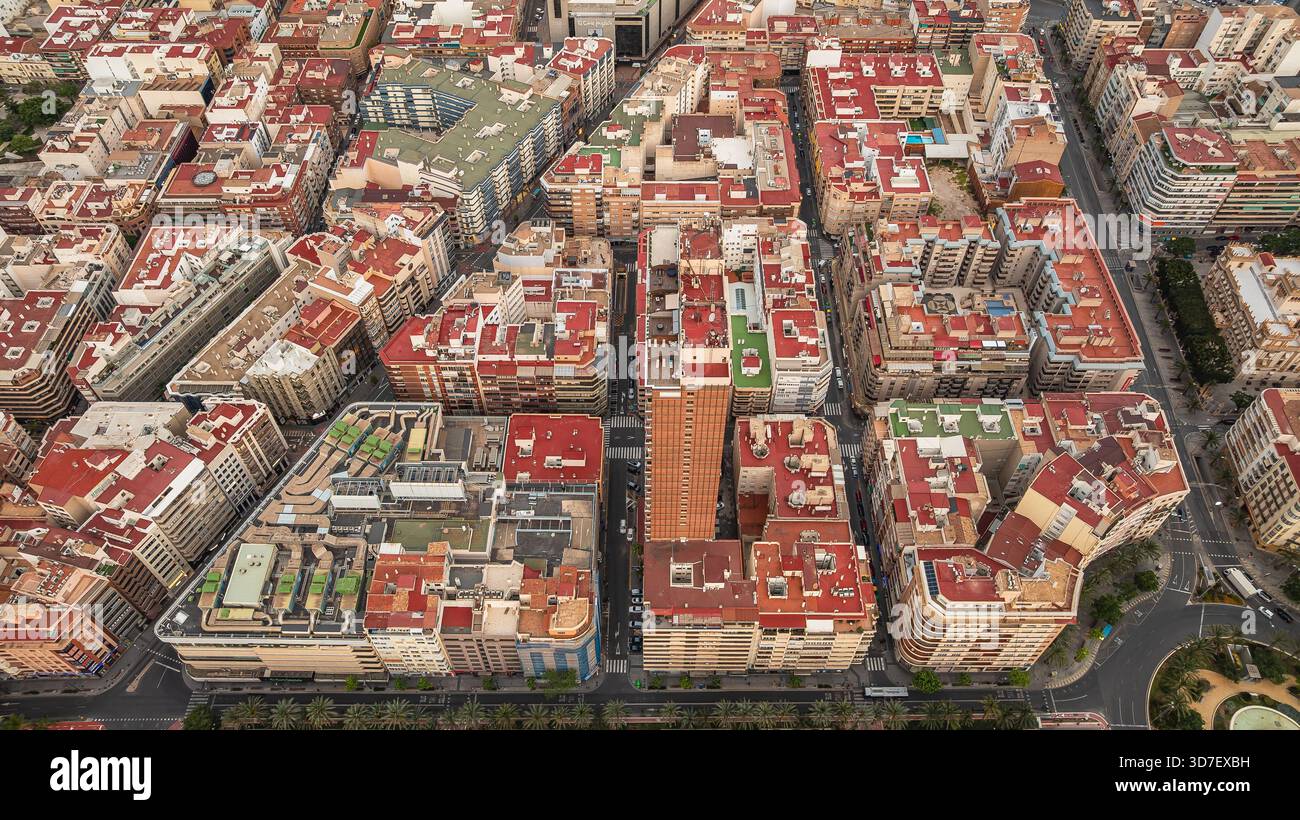 Aerial view of colorful rooftops and roads of city. Residential areas ...
