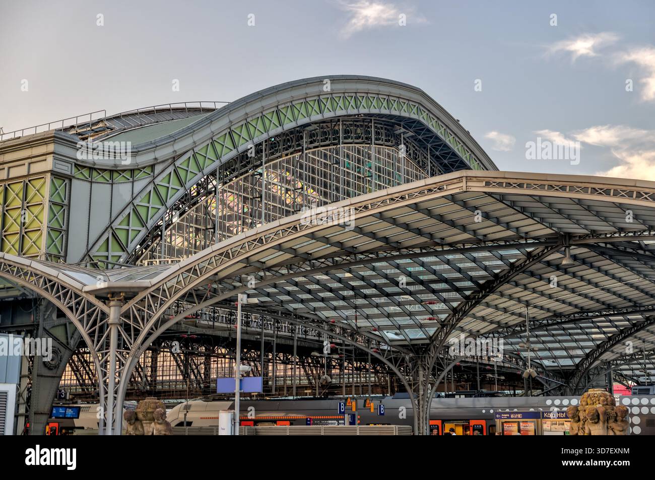 Arched iron and glass roof structure of Köln Hauptbahnhof rail station ...