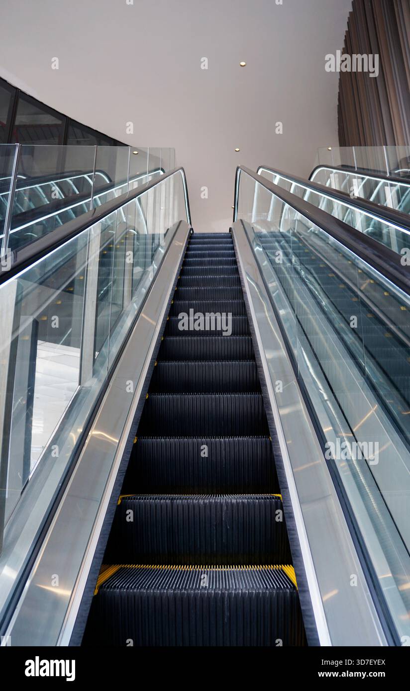 Concept photo of glass auto electric escalator with led lighting system ...