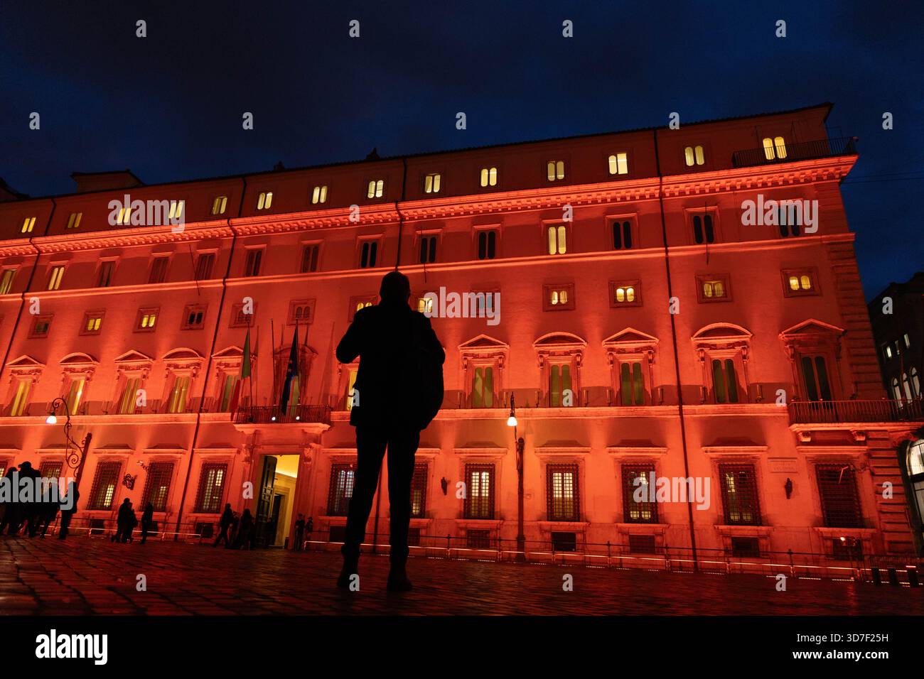 Palazzo Chigi in Rome lit up in red for the International Day for the Elimination of Violence ...