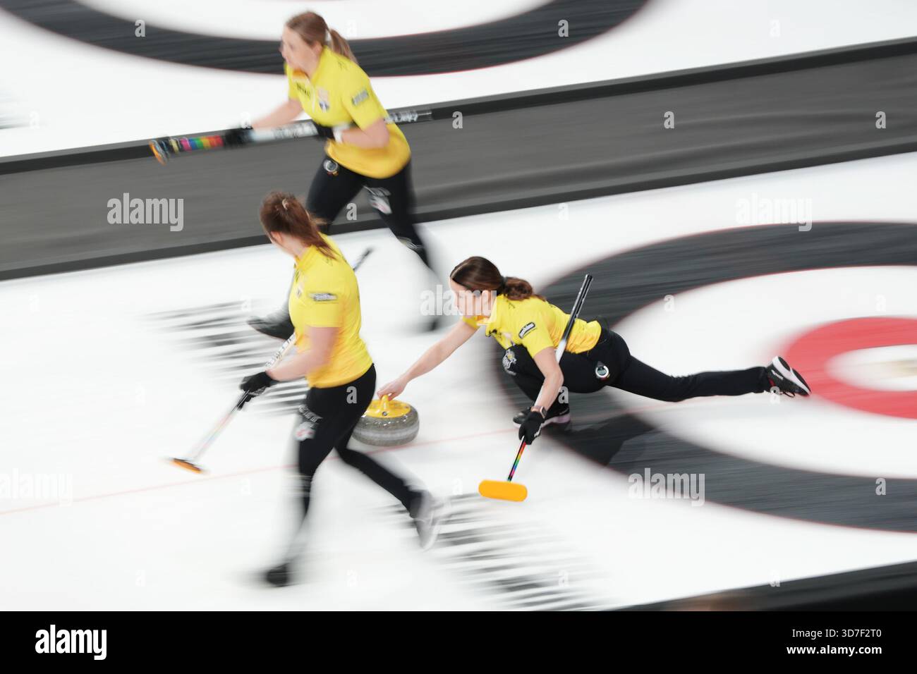 Kaitlyn Lawes, right, throws a rock during Canadian Olympic curling ...