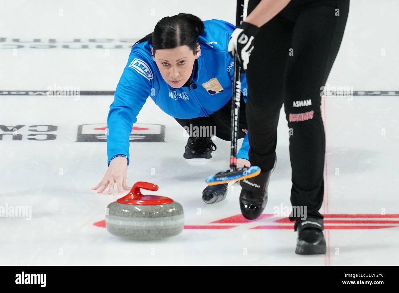 Kate Cameron throws a rock during Canadian Olympic curling trials ...