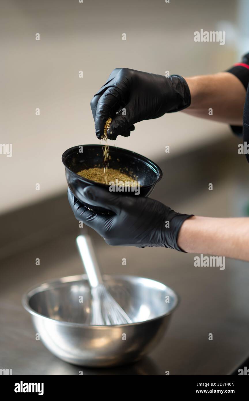 Pouring salt professional chef hi-res stock photography and images - Alamy