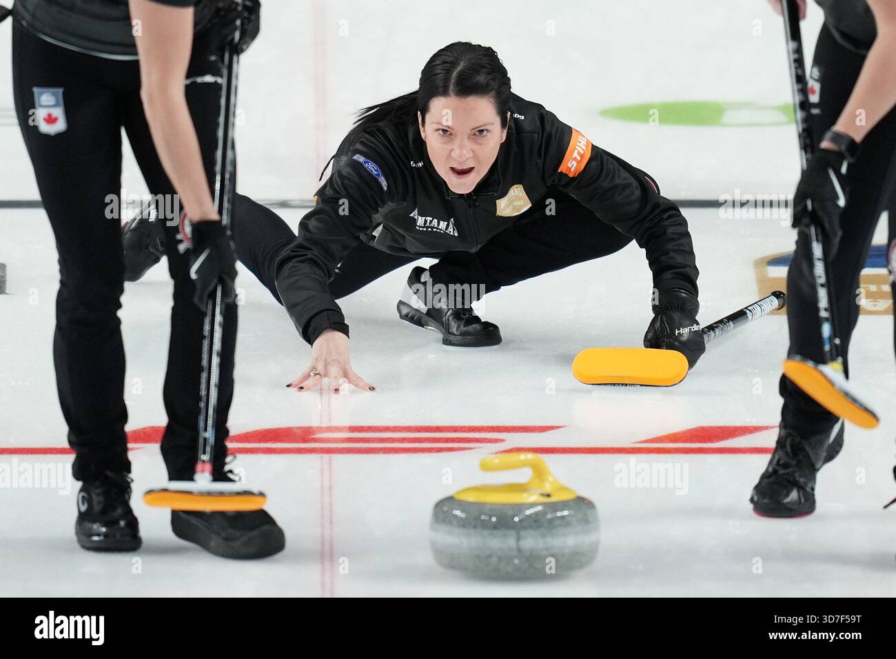 Kerri Einarson throws a rock during Canadian Olympic curling trials ...