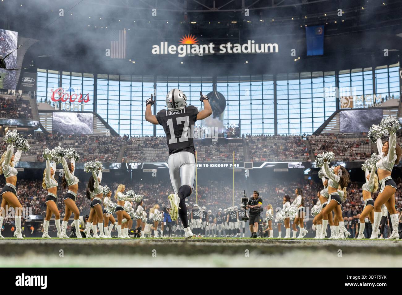 Las Vegas Raiders wide receiver Tyler Lockett (17) enters the field ...