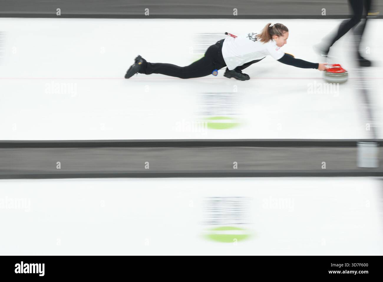 Rachel Homan, right, throws a rock during Canadian Olympic curling ...