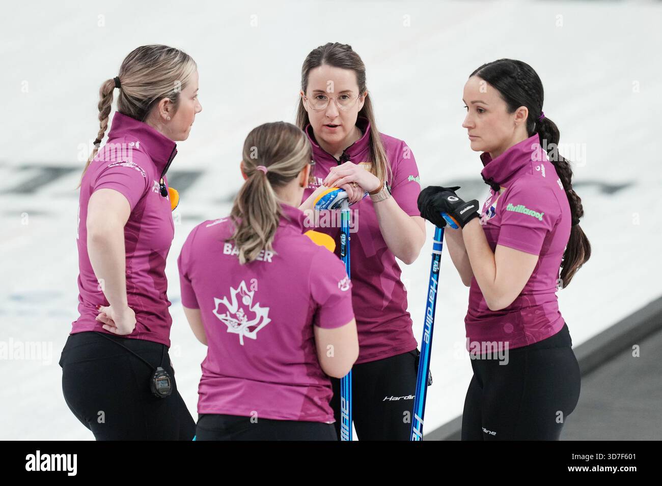 Christina Black, second from right, speaks with teammates during ...