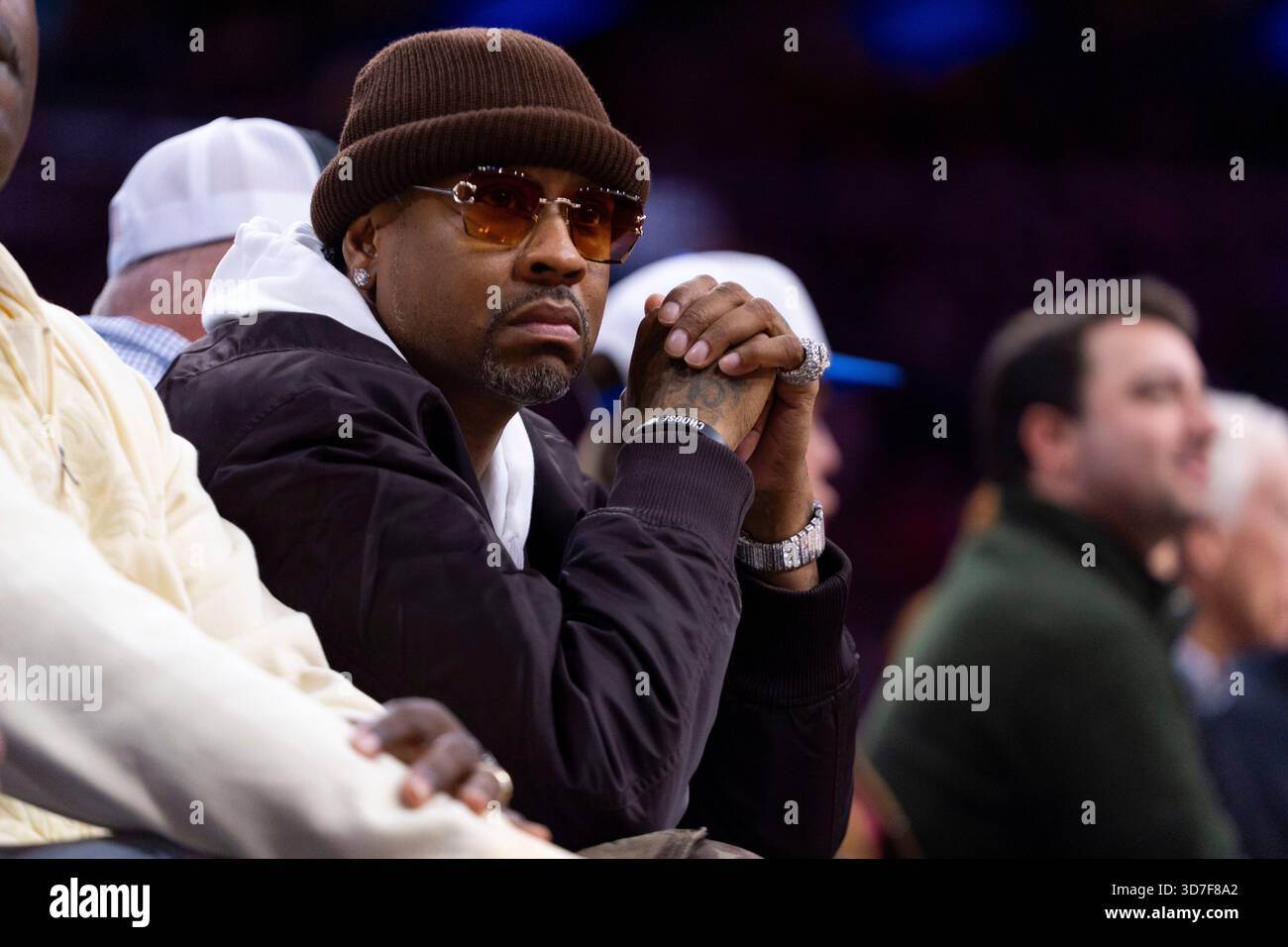 Former Philadelphia 76ers Allen Iverson looks on during an NBA ...