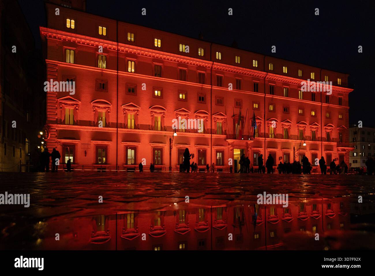 Palazzo Chigi in Rome lit up in red for the International Day for the Elimination of Violence ...