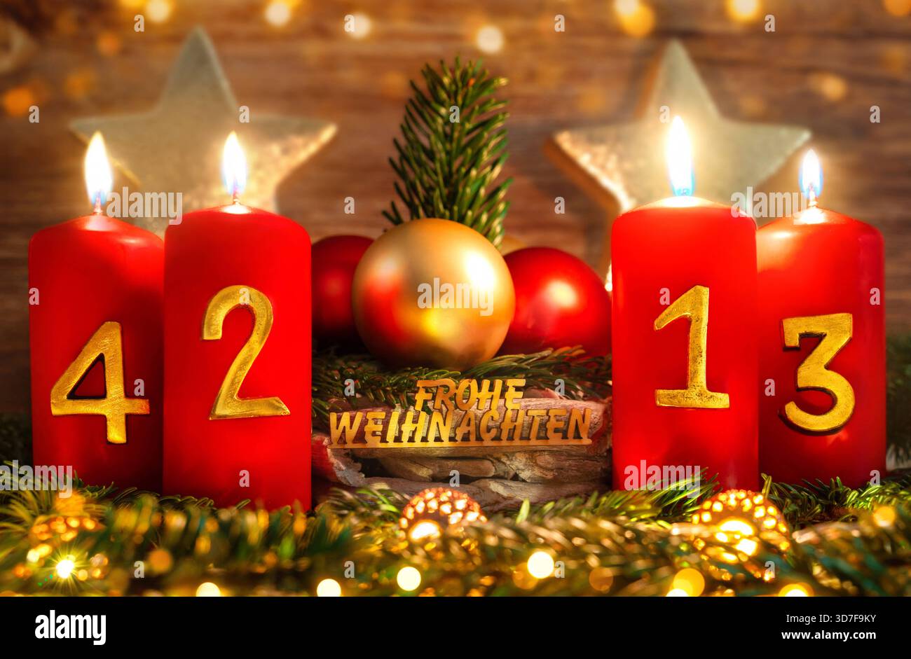 Bavaria, Germany - November 24, 2025: Four burning red Advent candles ...
