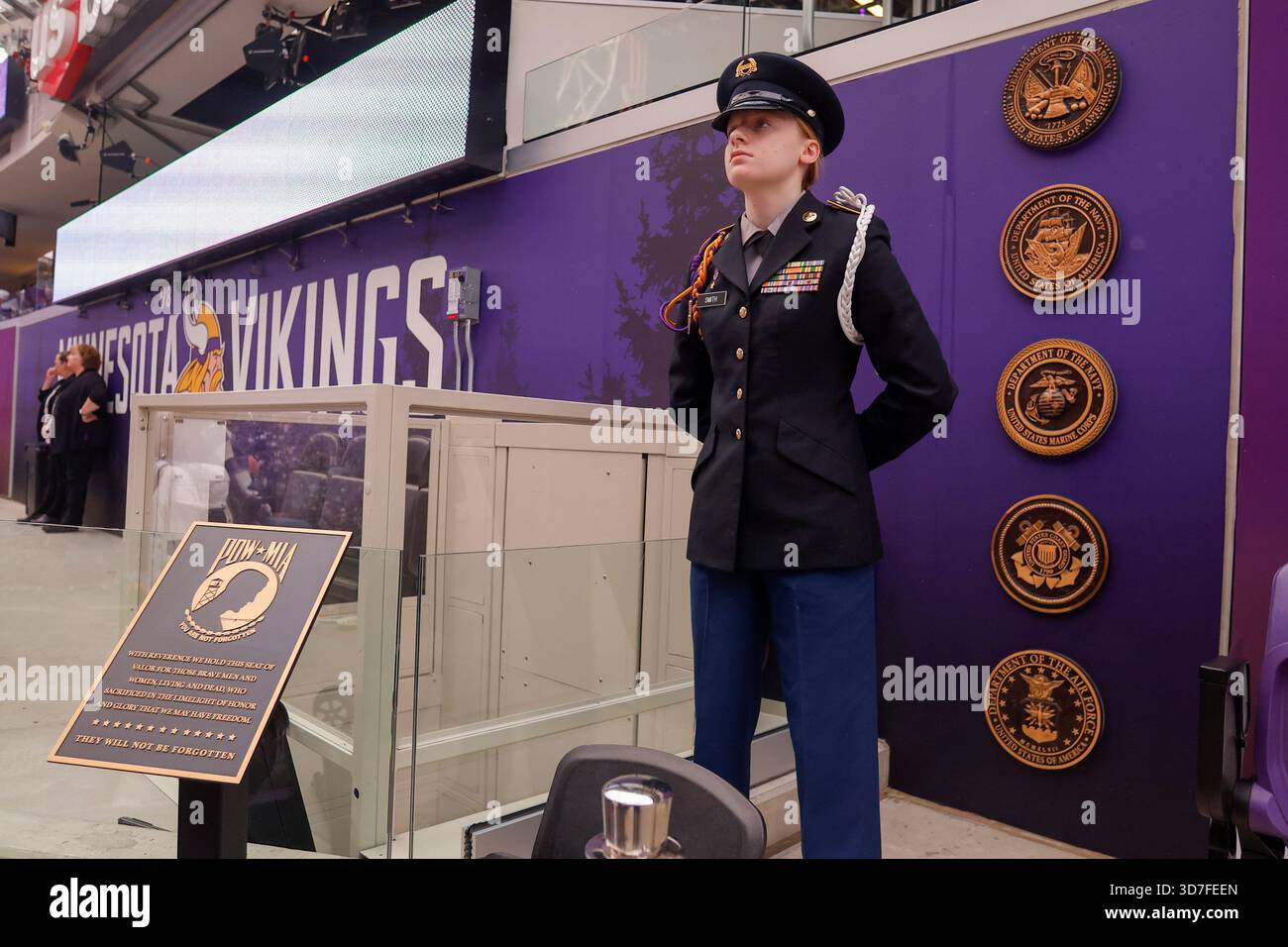 A service member stands guard at the POW MIA memorial before the start ...